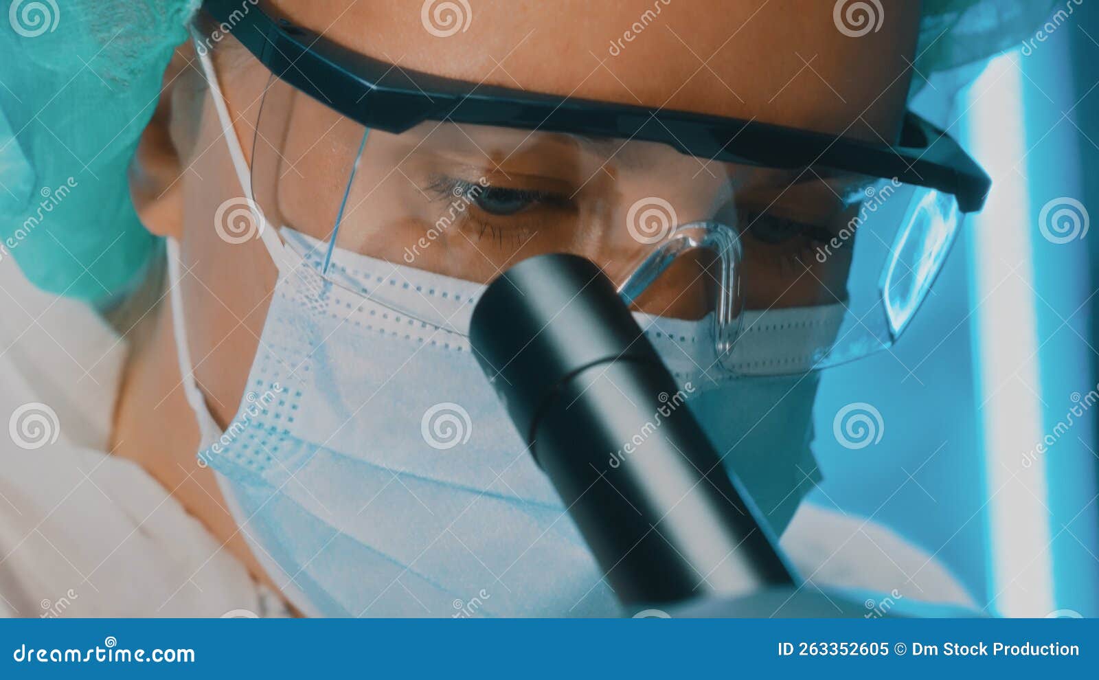 Scientist using microscope stock image. Image of analysis - 263352605