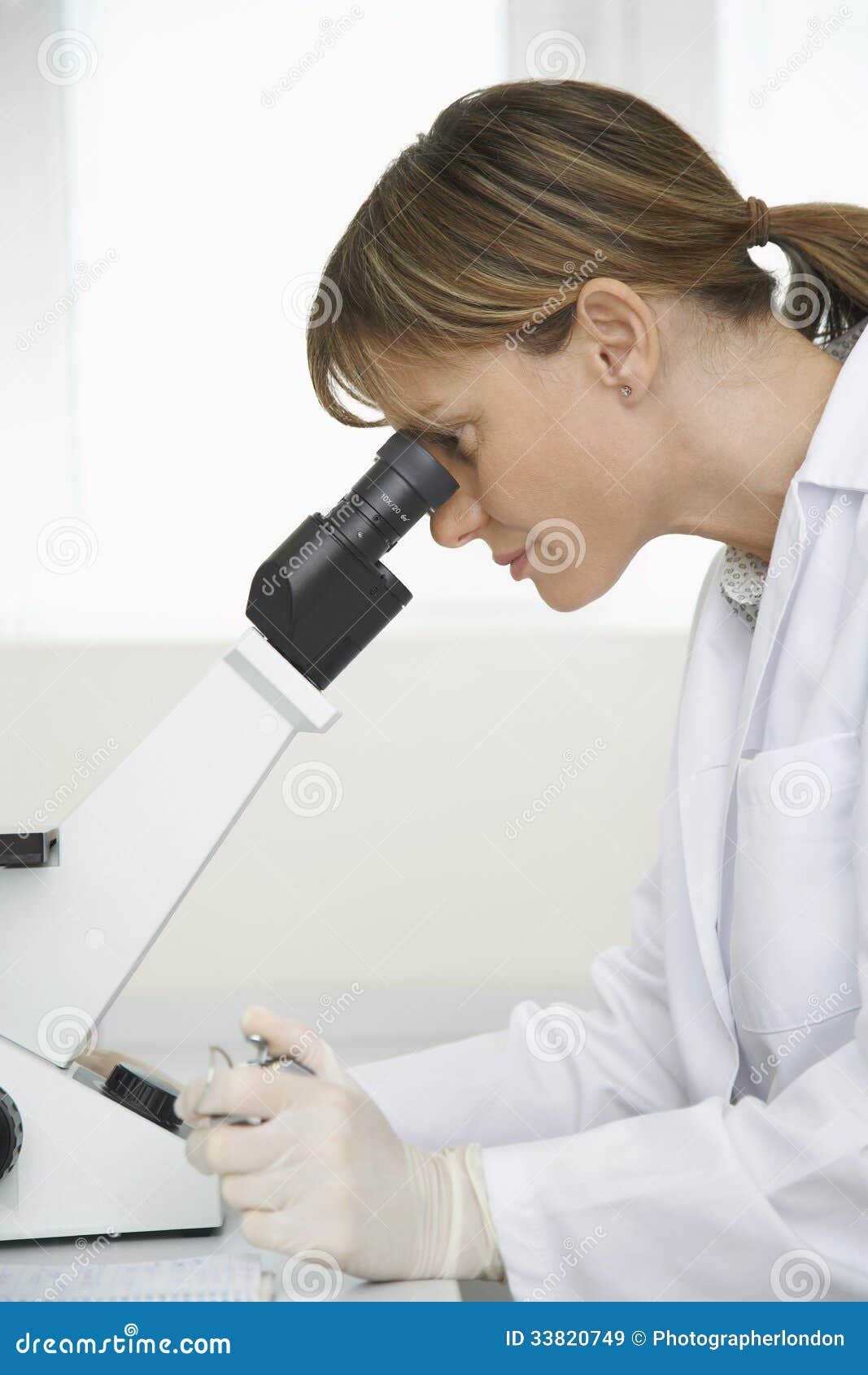 Scientist Using Microscope in Laboratory Stock Image - Image of ...