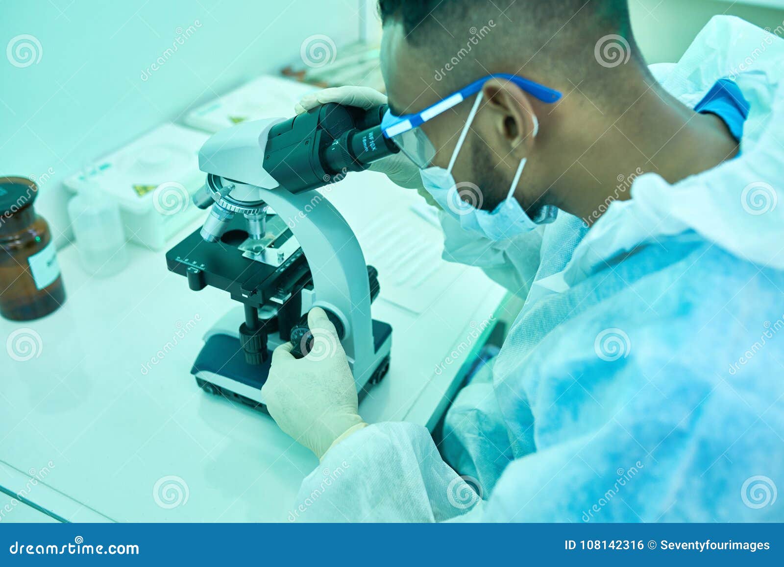 Scientist Using Microscope in Medical Lab Stock Photo - Image of ...