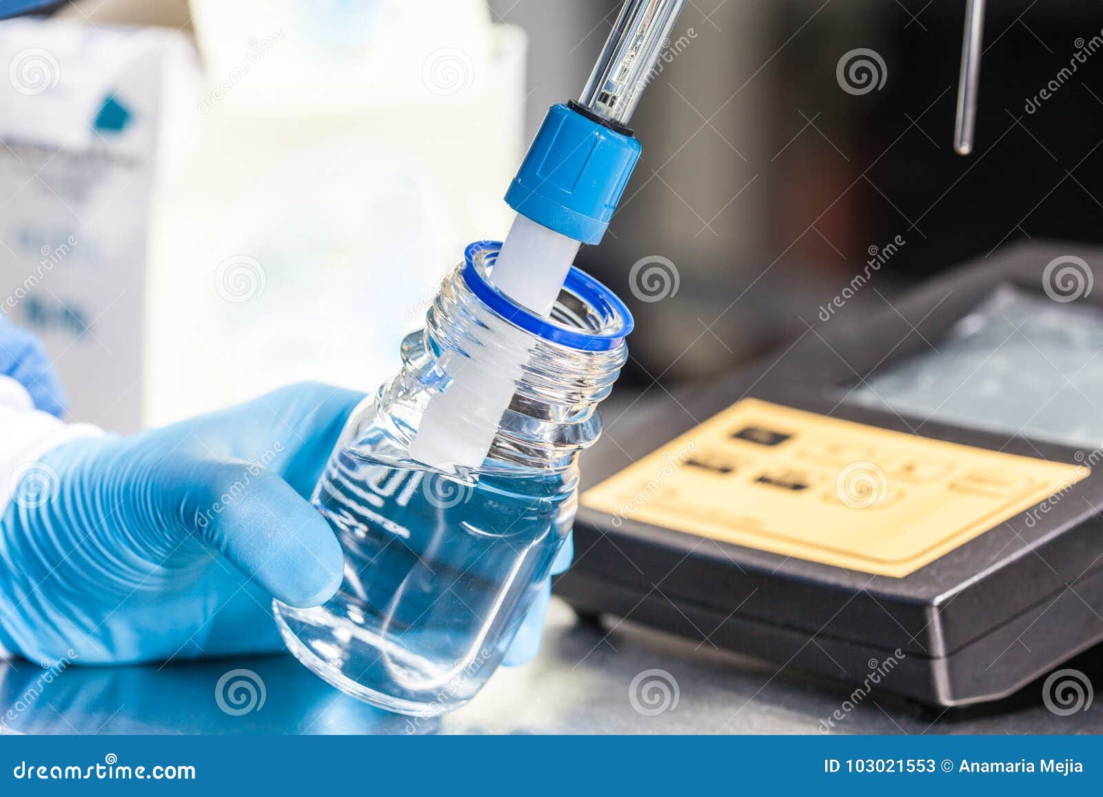 Scientist using a ph meter stock image. Image of hand - 103021553