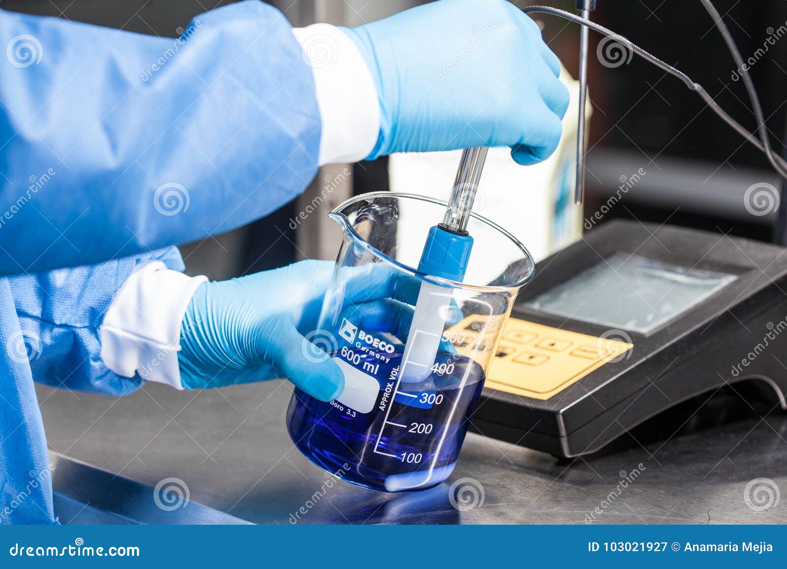 Scientist using a ph meter stock image. Image of measuring - 103021927