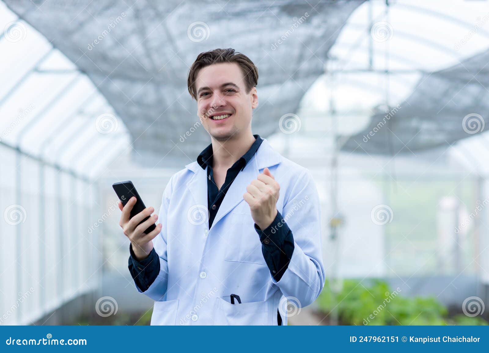 Scientist Using Smartphone and Social Media. Scientist Work at ...