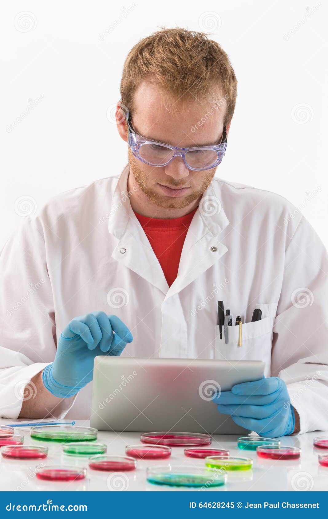 Scientist Using Tablet in Microbiology Laboratory Stock Image - Image ...