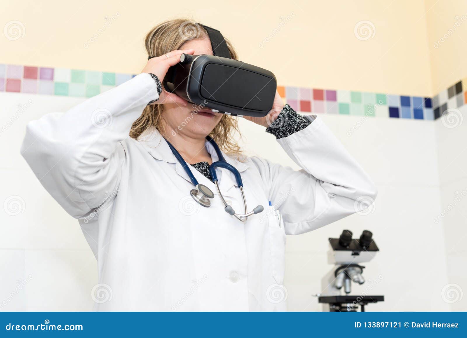 Scientist Using Virtual Reality Glasses for Research in Laboratory ...
