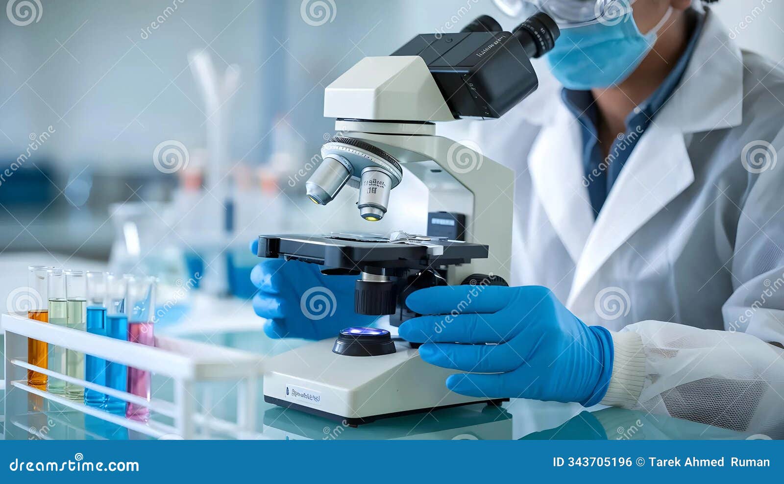 A Scientist Wearing A Lab Coat, Mask, And Blue Gloves Operates A ...