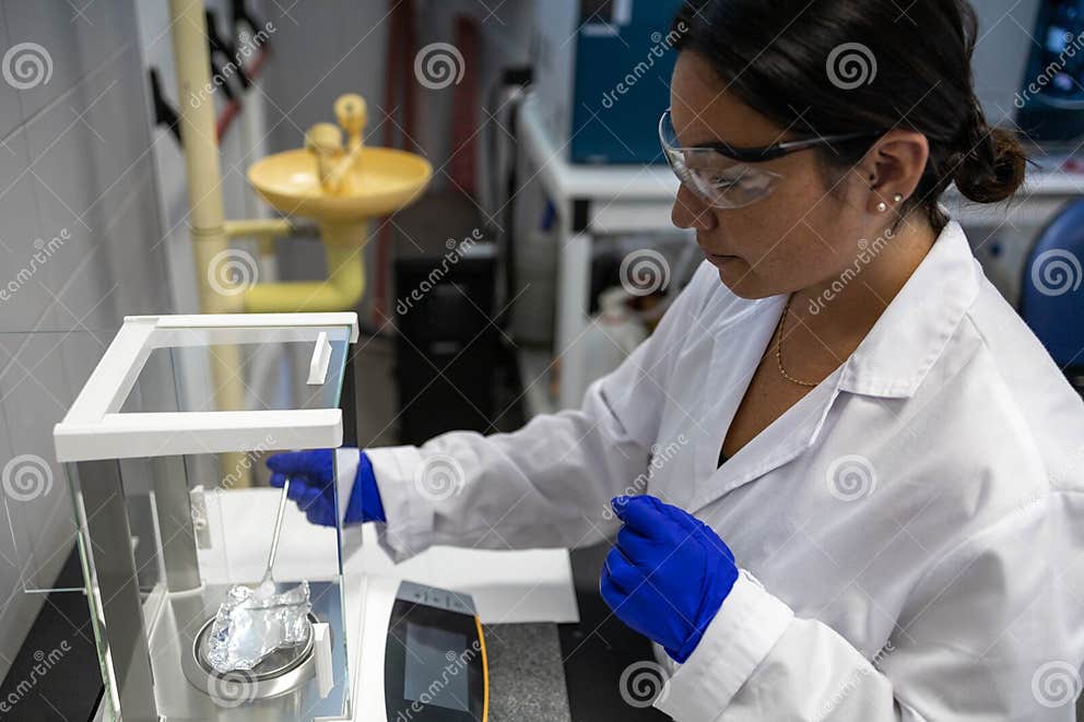 Scientist Weighing a Sample on a Scale Stock Photo - Image of work ...