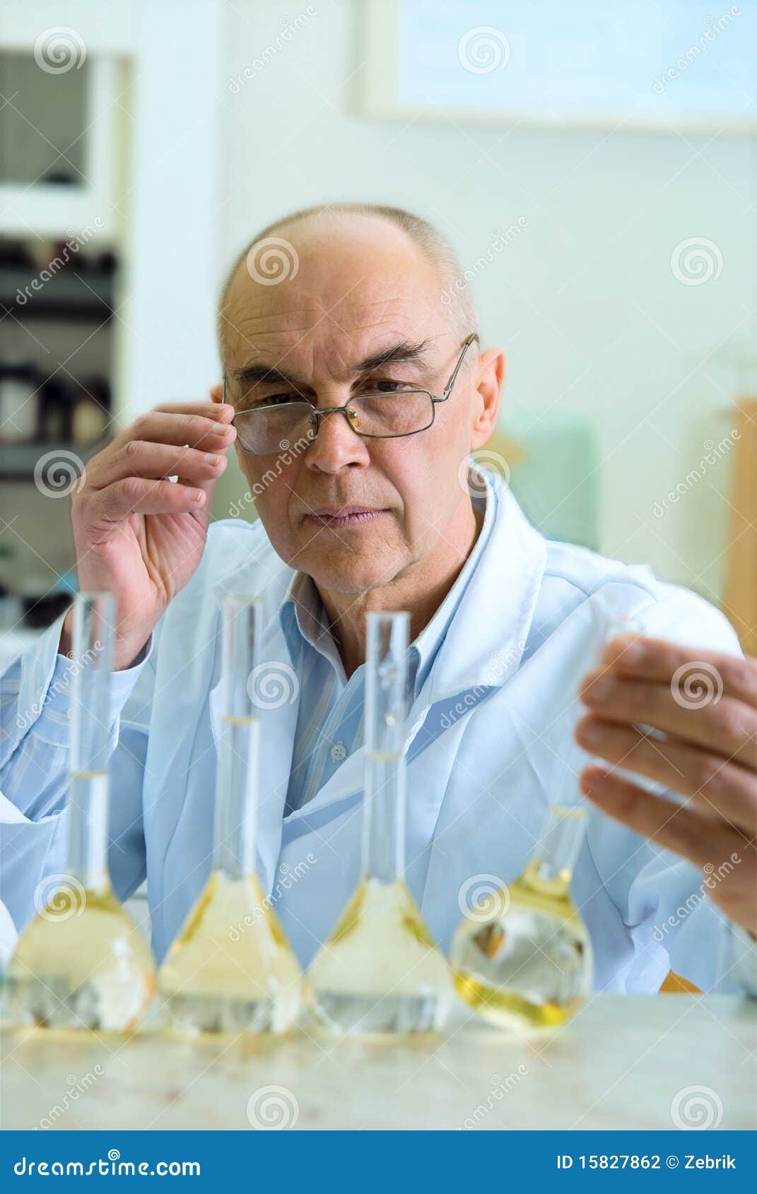 A Scientist Who Conducts Experiments Stock Photo - Image of conical ...