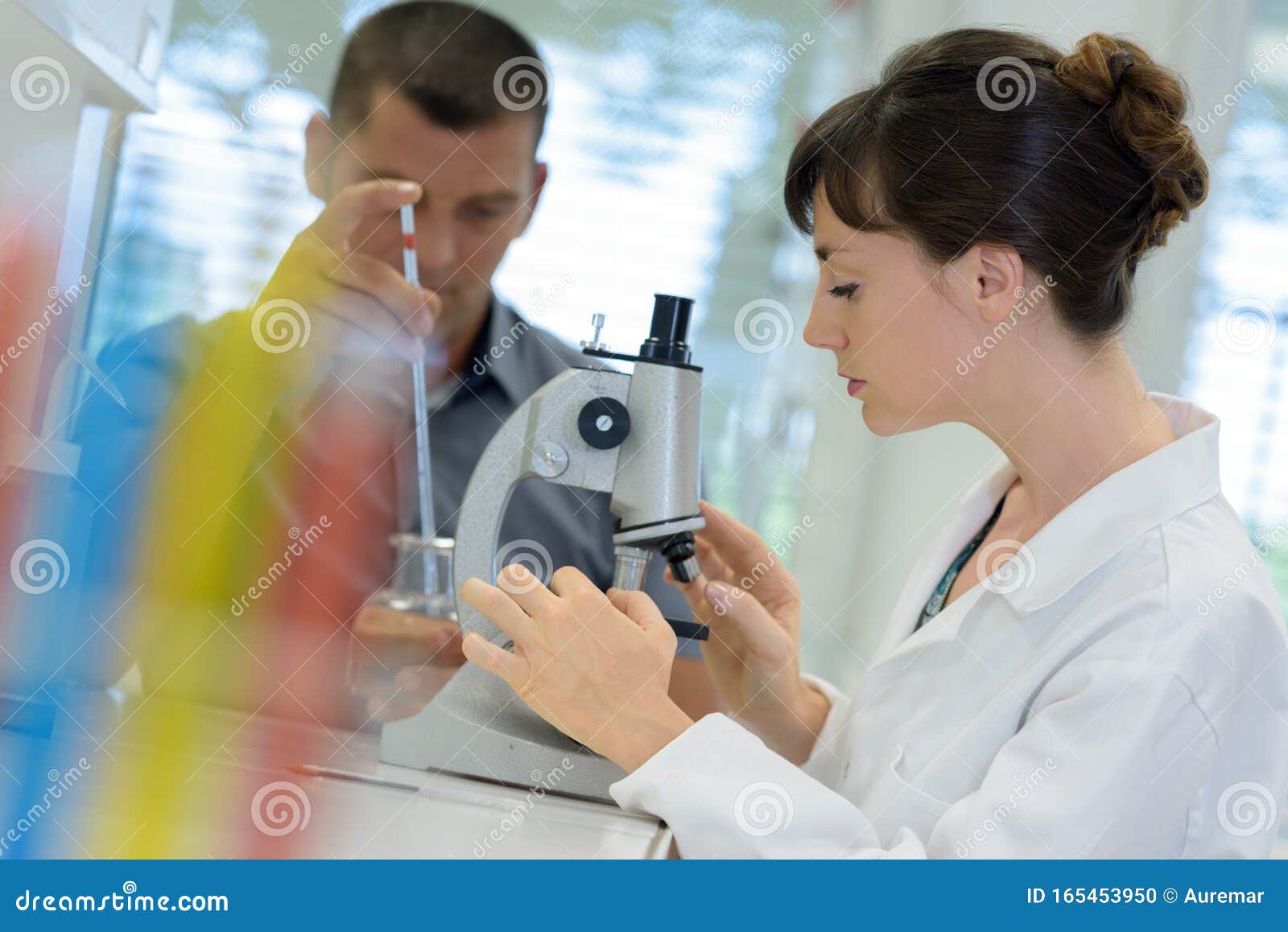 Scientist Women Check Sample In Vials For Analysis By Fourier Transform ...