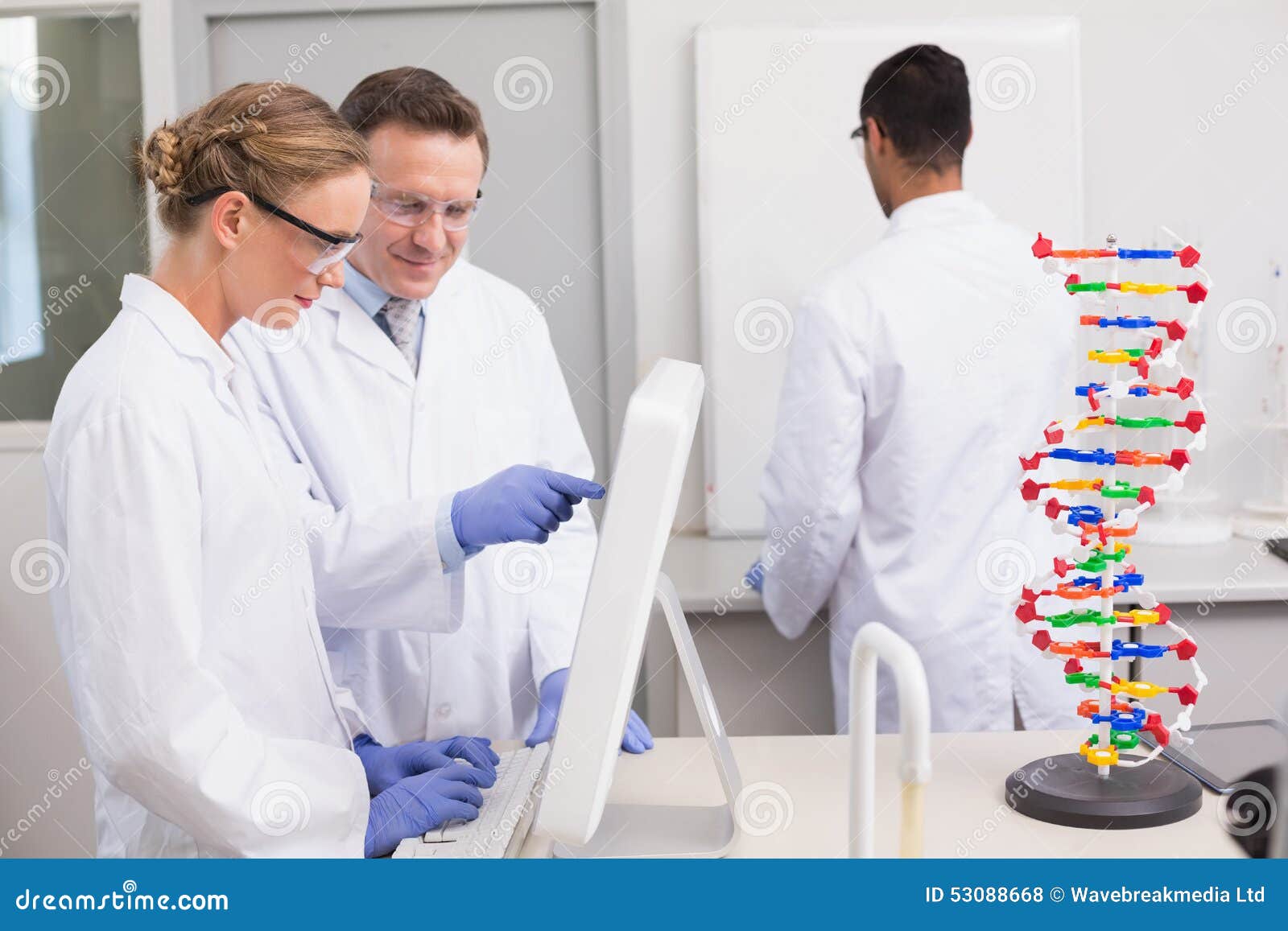 Scientist Working with Computer Stock Photo - Image of mixedrace ...