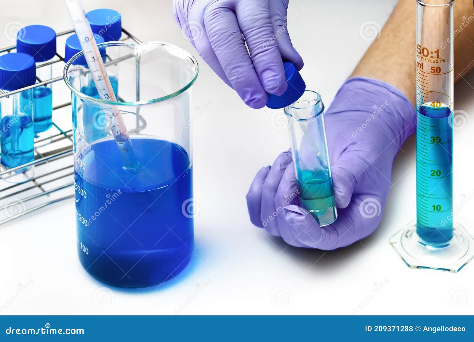 Scientist Working with Fluids at Laboratory Workbench Stock Photo ...