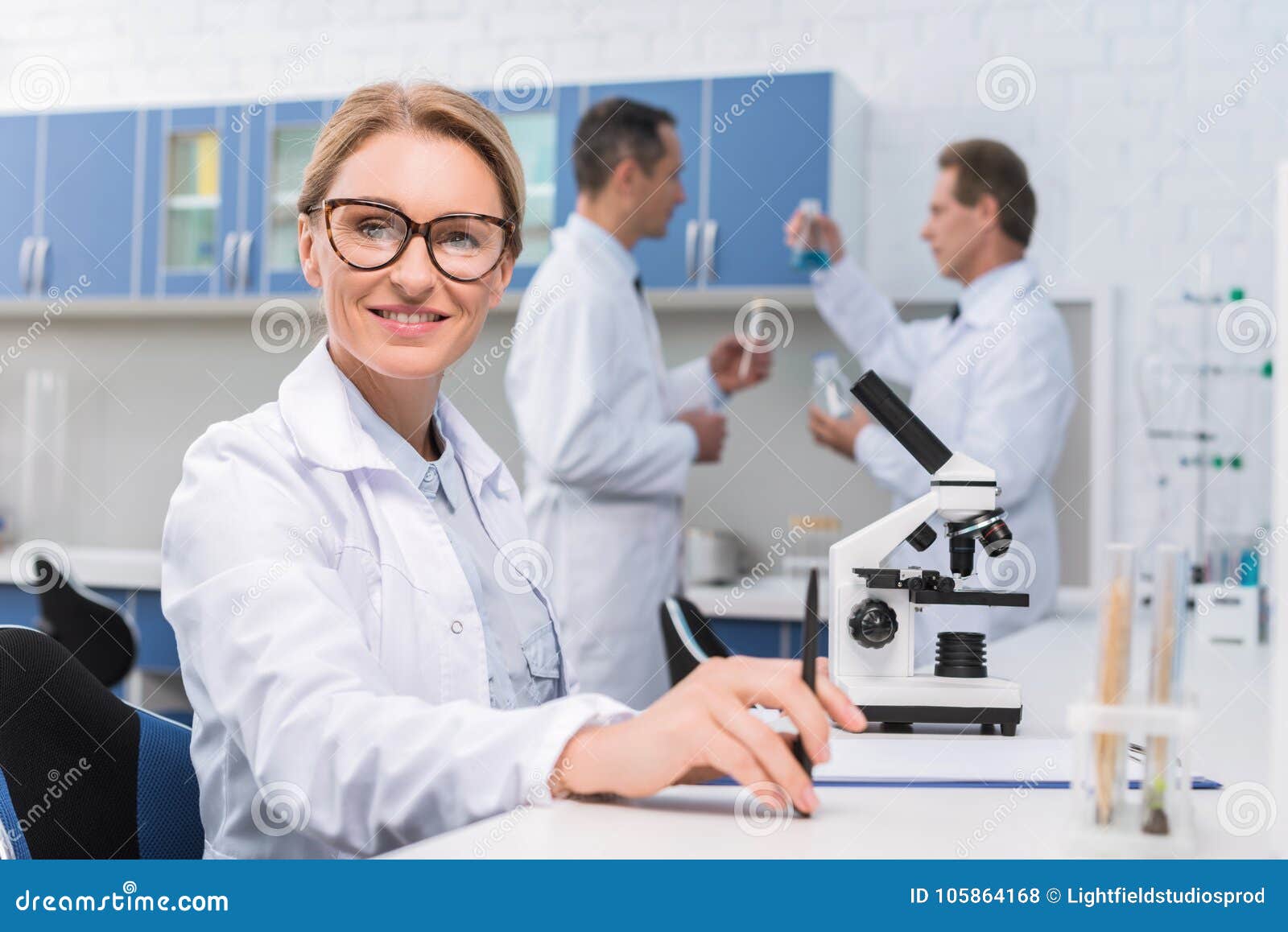 Scientist working in lab stock photo. Image of beautiful - 105864168