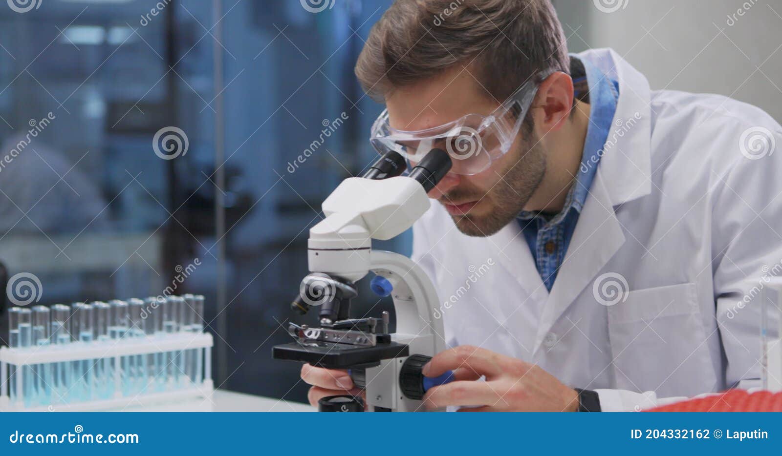 Scientist Working in Lab. Doctor Making Medical Research Using ...