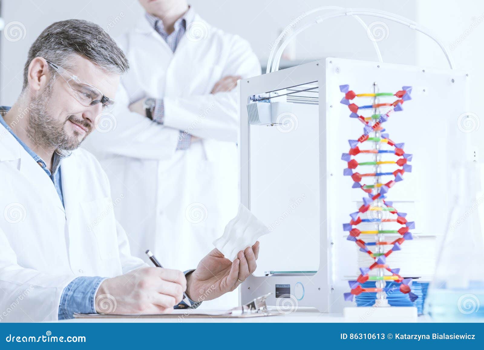 Scientist holding 3d model stock image. Image of male - 86310613