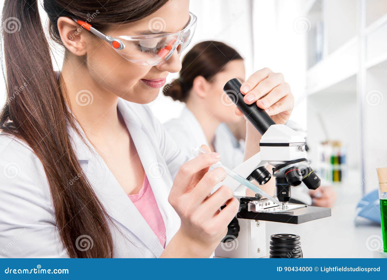Scientist Working with Microscope Stock Photo - Image of people ...