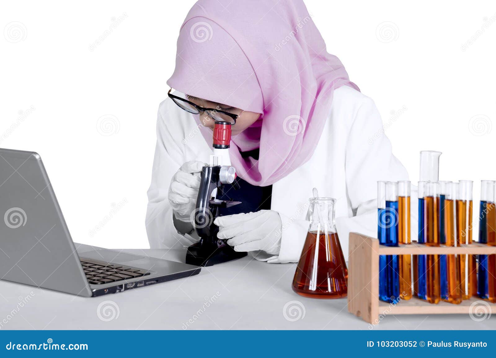 Scientist Works with Microscope and Laptop Stock Photo - Image of ...