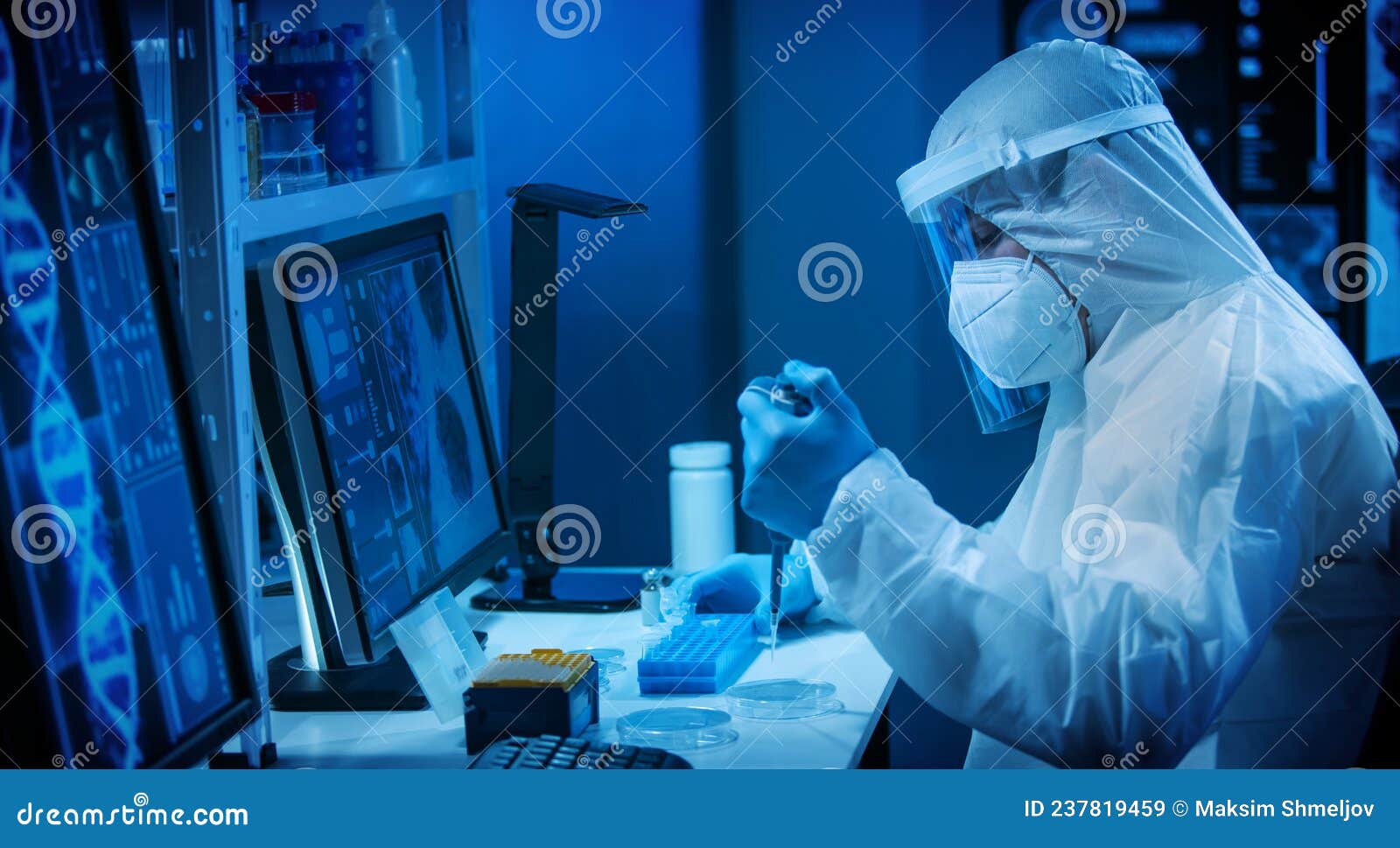 Scientist Works in a Modern Scientific Lab Using Laboratory Equipment ...