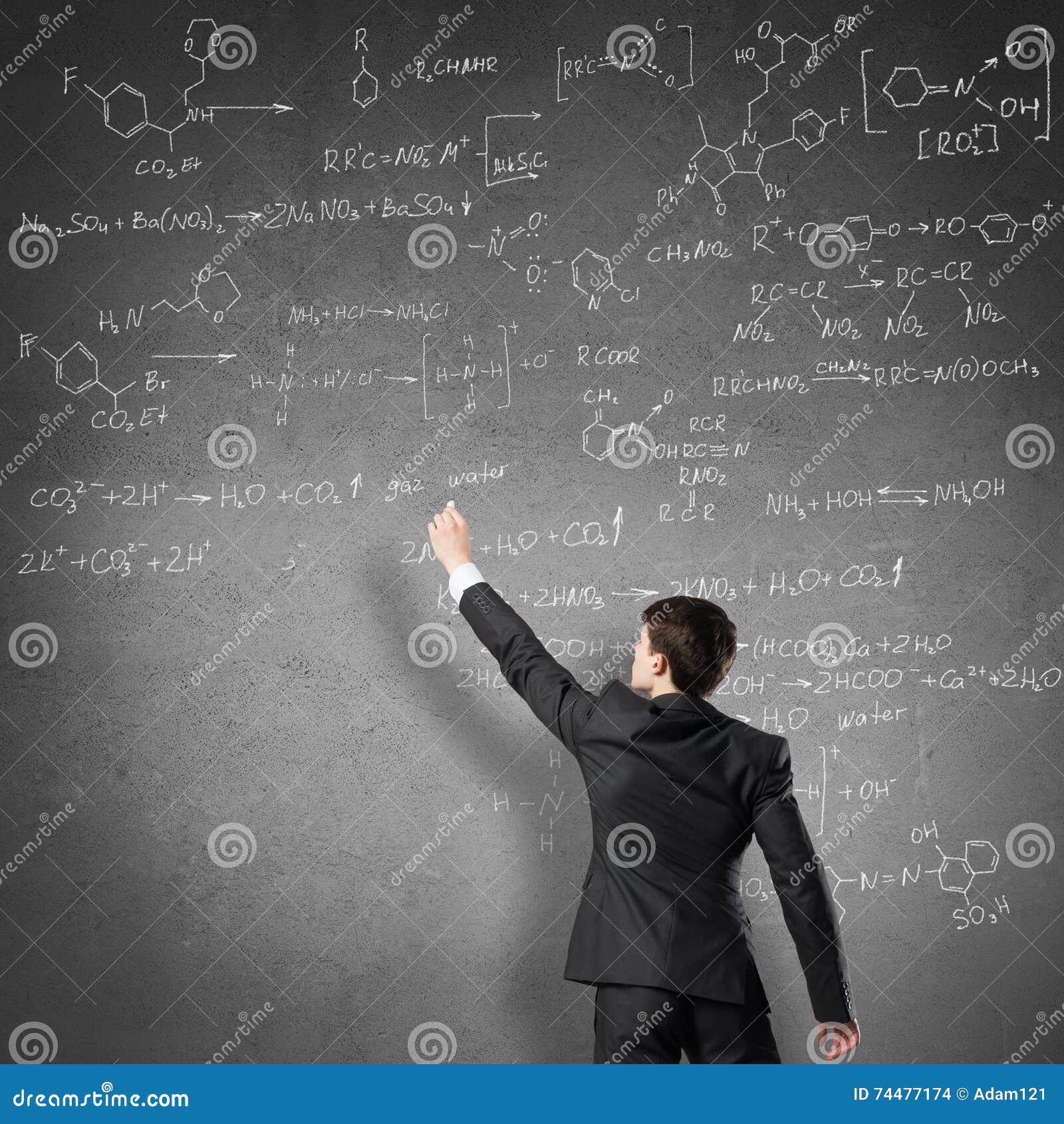 Scientist Writing Formulas on Chalkboard Stock Photo - Image of male ...