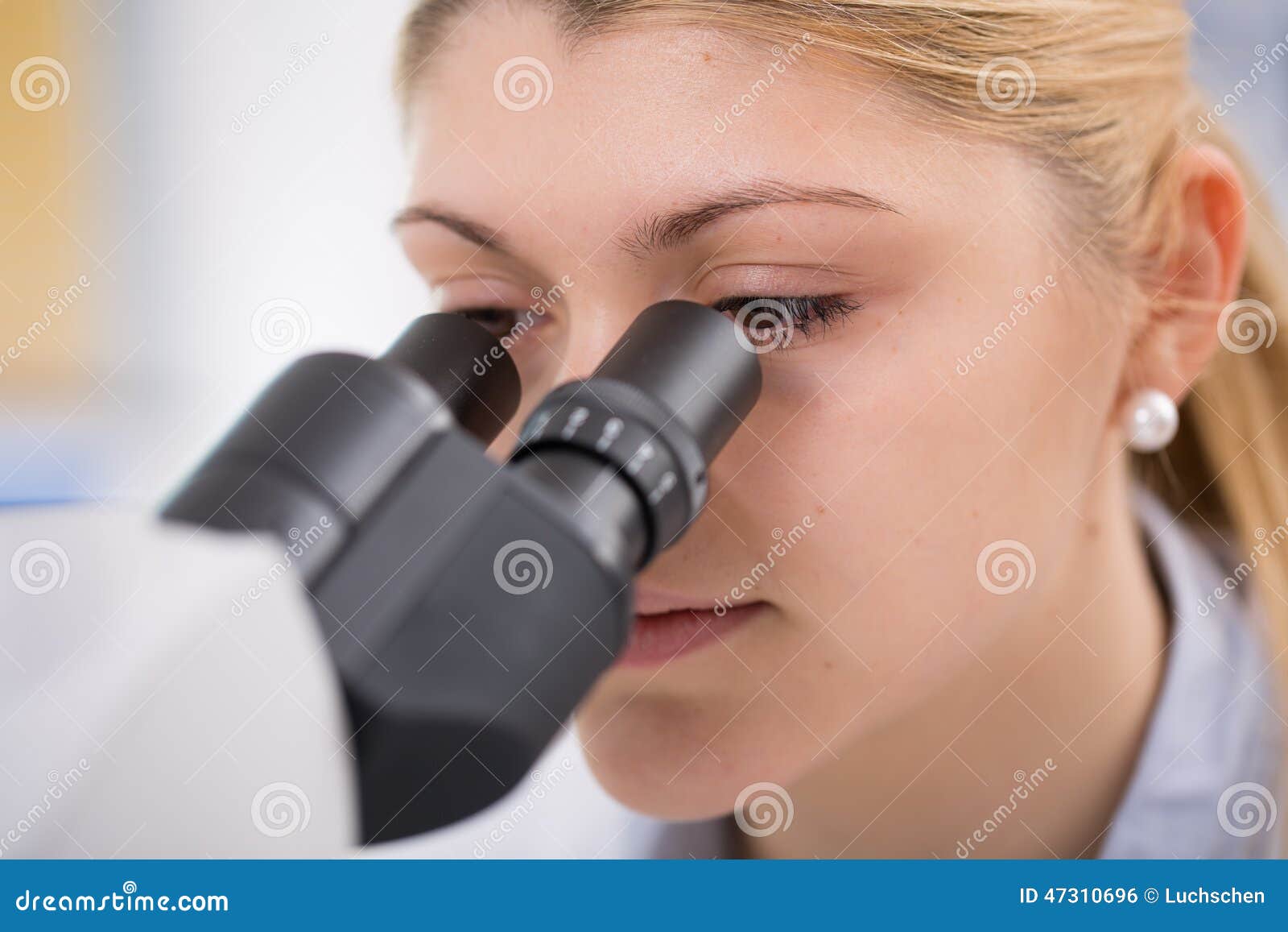 Scientist Young Woman Using a Microscope in a Science Stock Photo ...