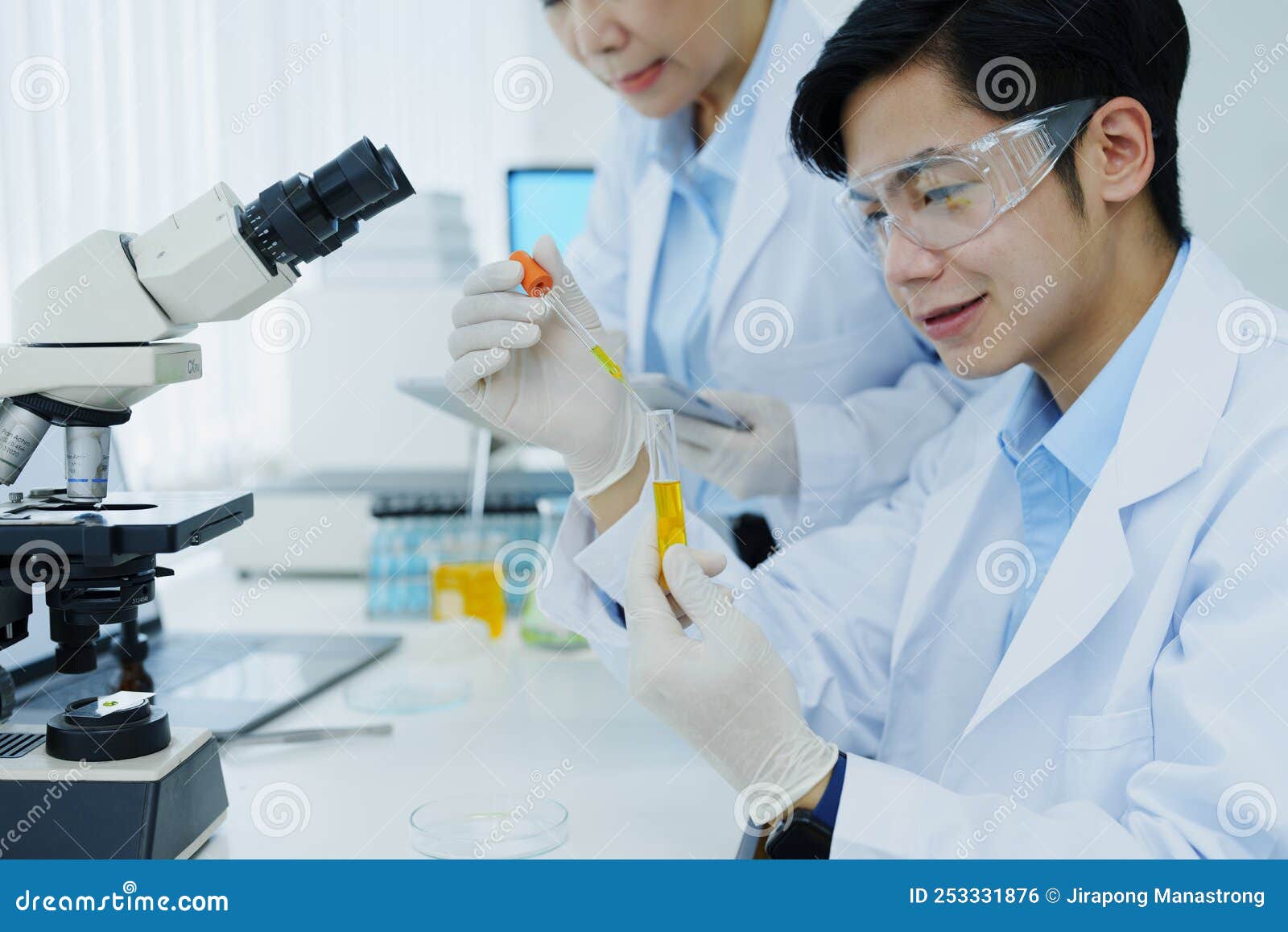 Scientists Analyze Chemical Samples Discuss Technological Innovations ...