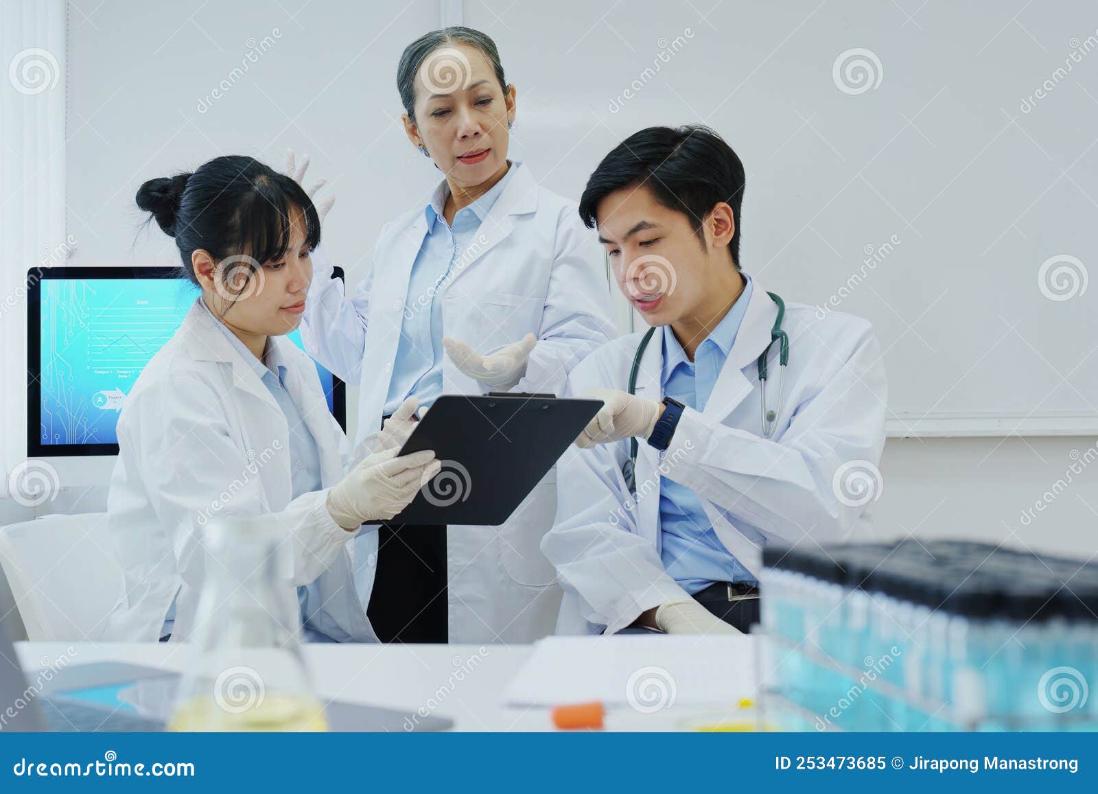 Scientists Analyze Chemical Samples Discuss Technological Innovations ...