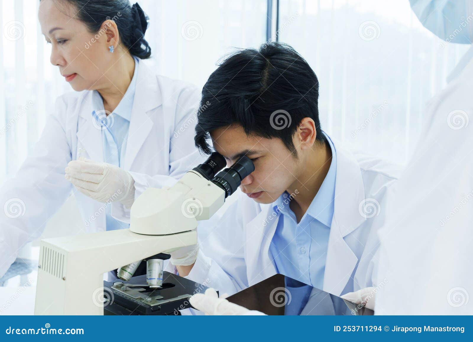 Scientists Analyze Chemical Samples Discuss Technological Innovations ...