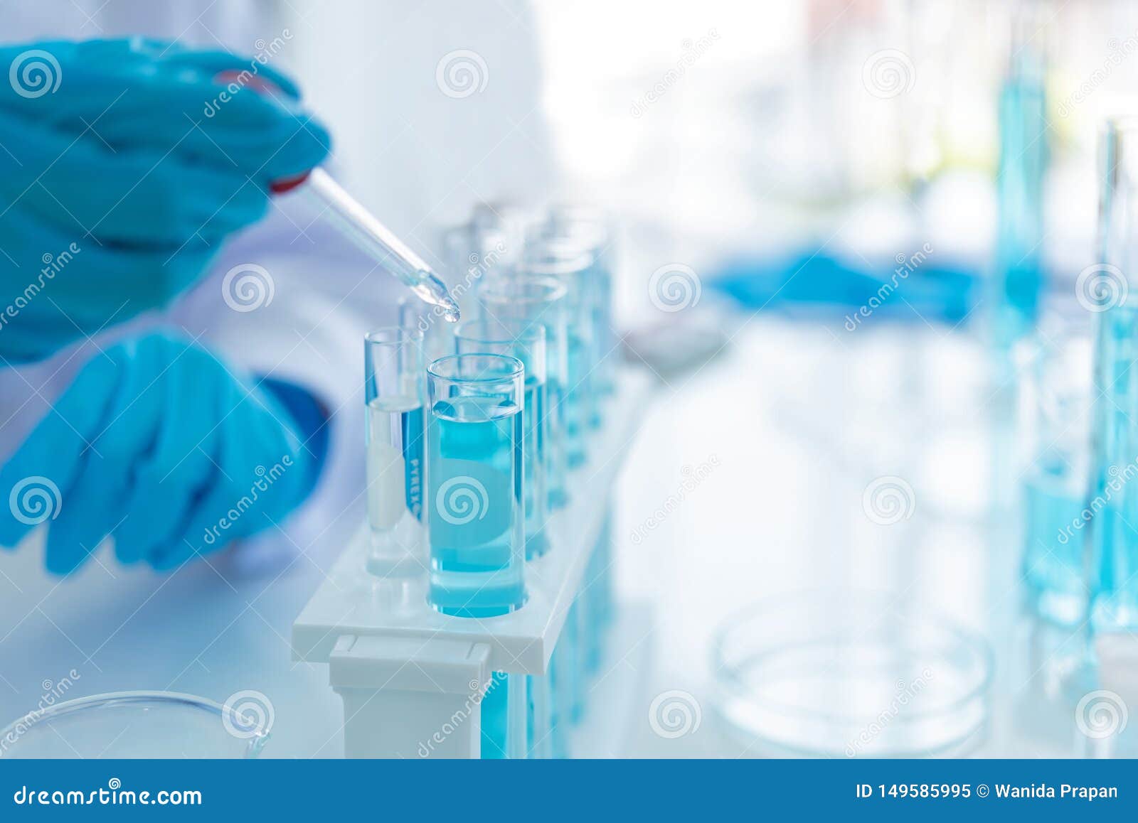Scientists Analyzing Study Data and Evaluating Microscope. Health Care ...