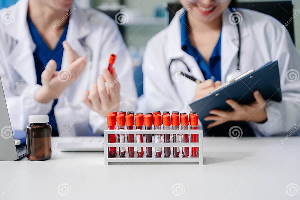 Scientists, Beakers, and Microscopes in Cutting-edge Research. Perfect ...