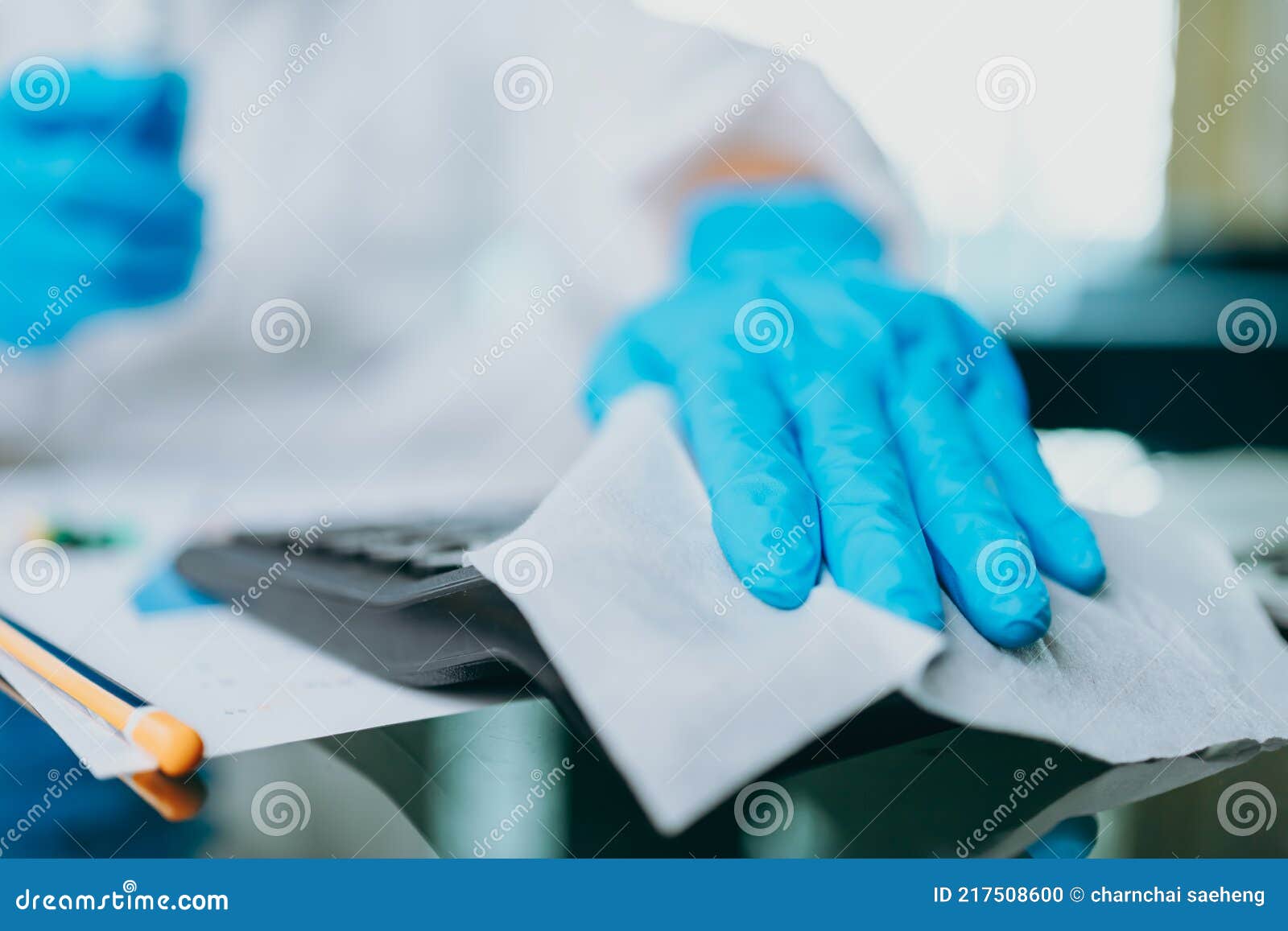 Scientists are Cleaning Calculate by Alcohol and Tissue after Checking ...