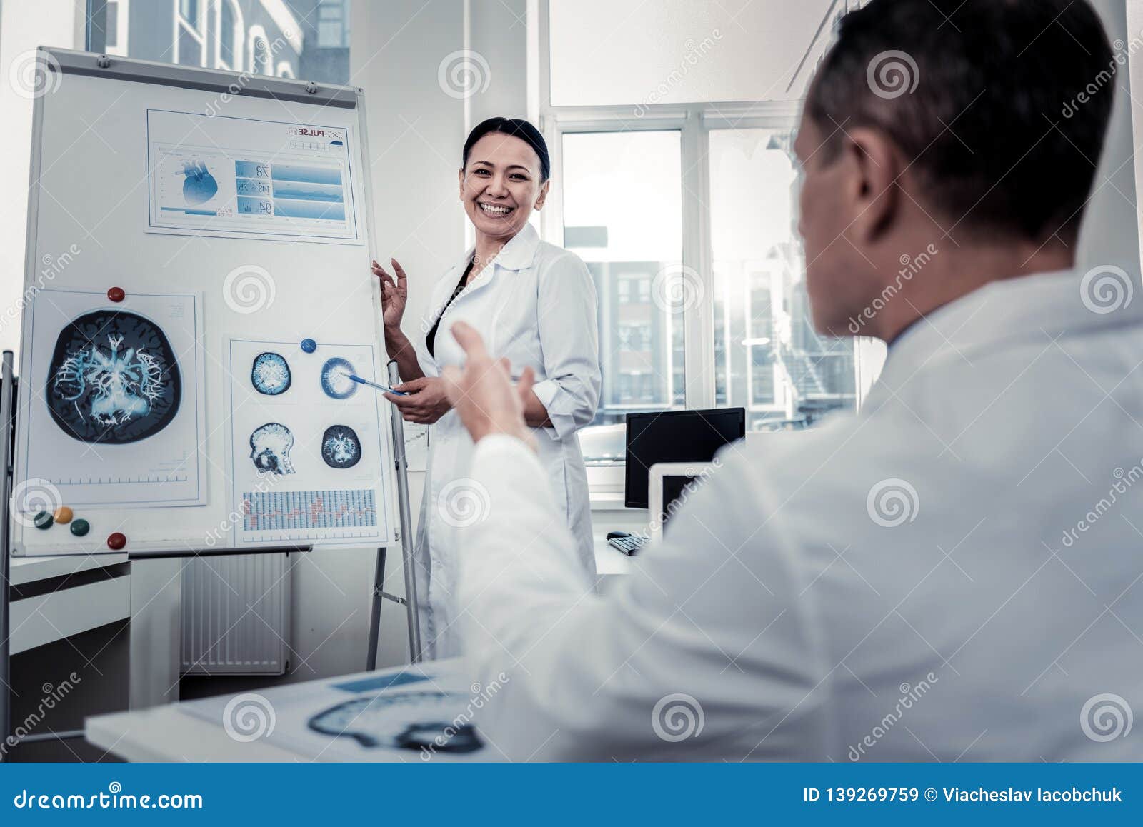 Scientists Discussing the Processes in Human Brain Stock Image - Image ...