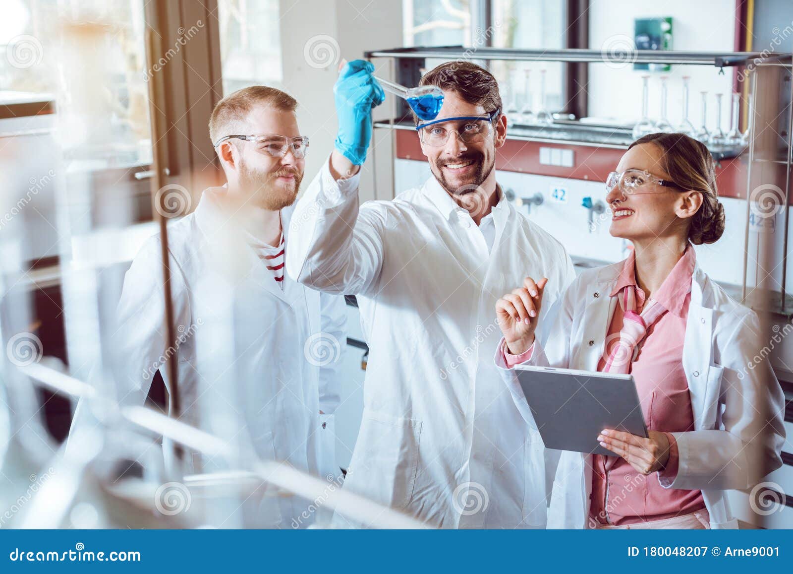 Scientists doing science stock image. Image of flask - 180048207