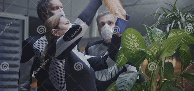 Scientists Examining Diseased Leaf on Mars Base Stock Image - Image of ...