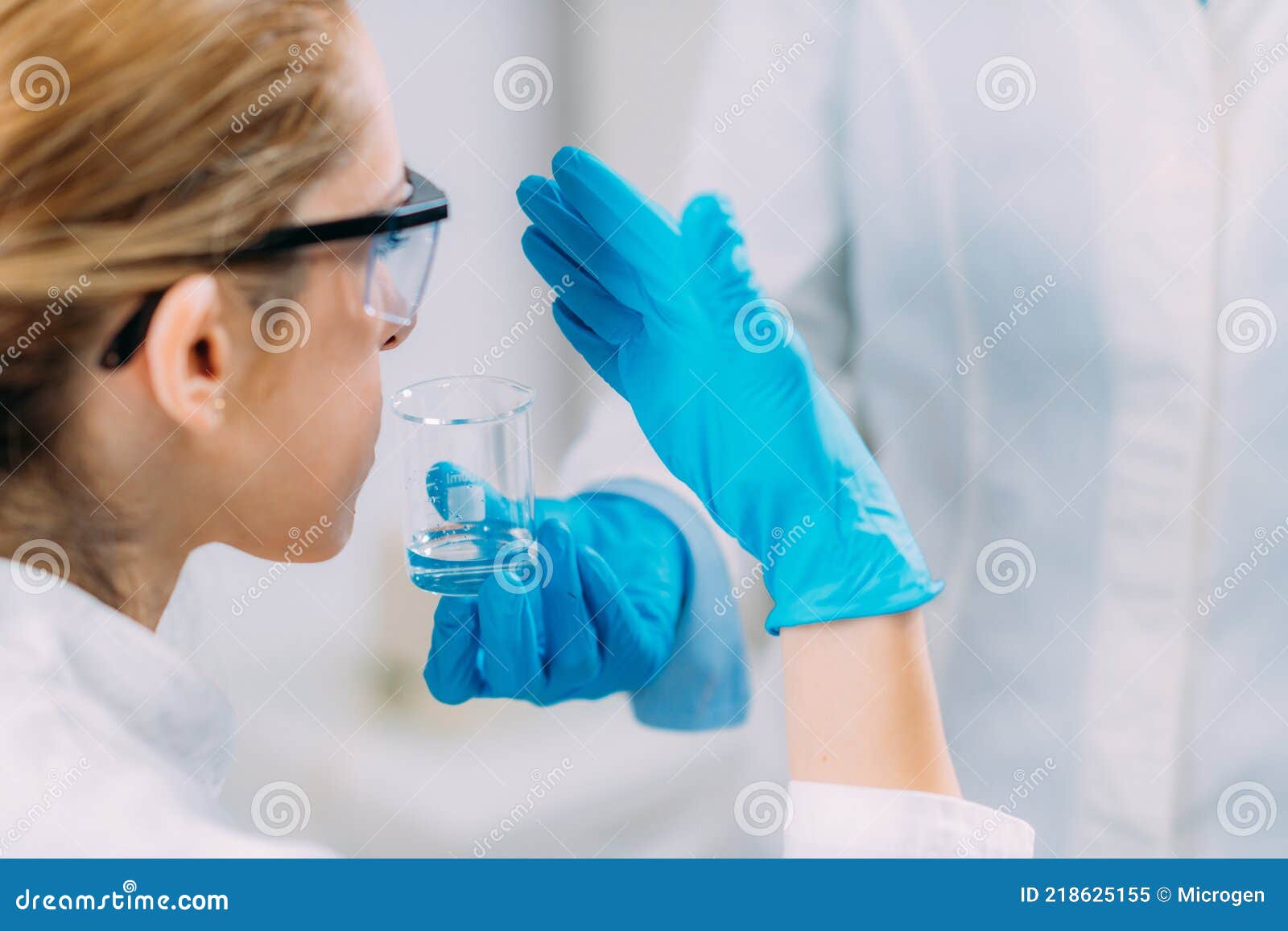 Scientists Examining the Smell of a Substance. Olfaction Laboratory ...
