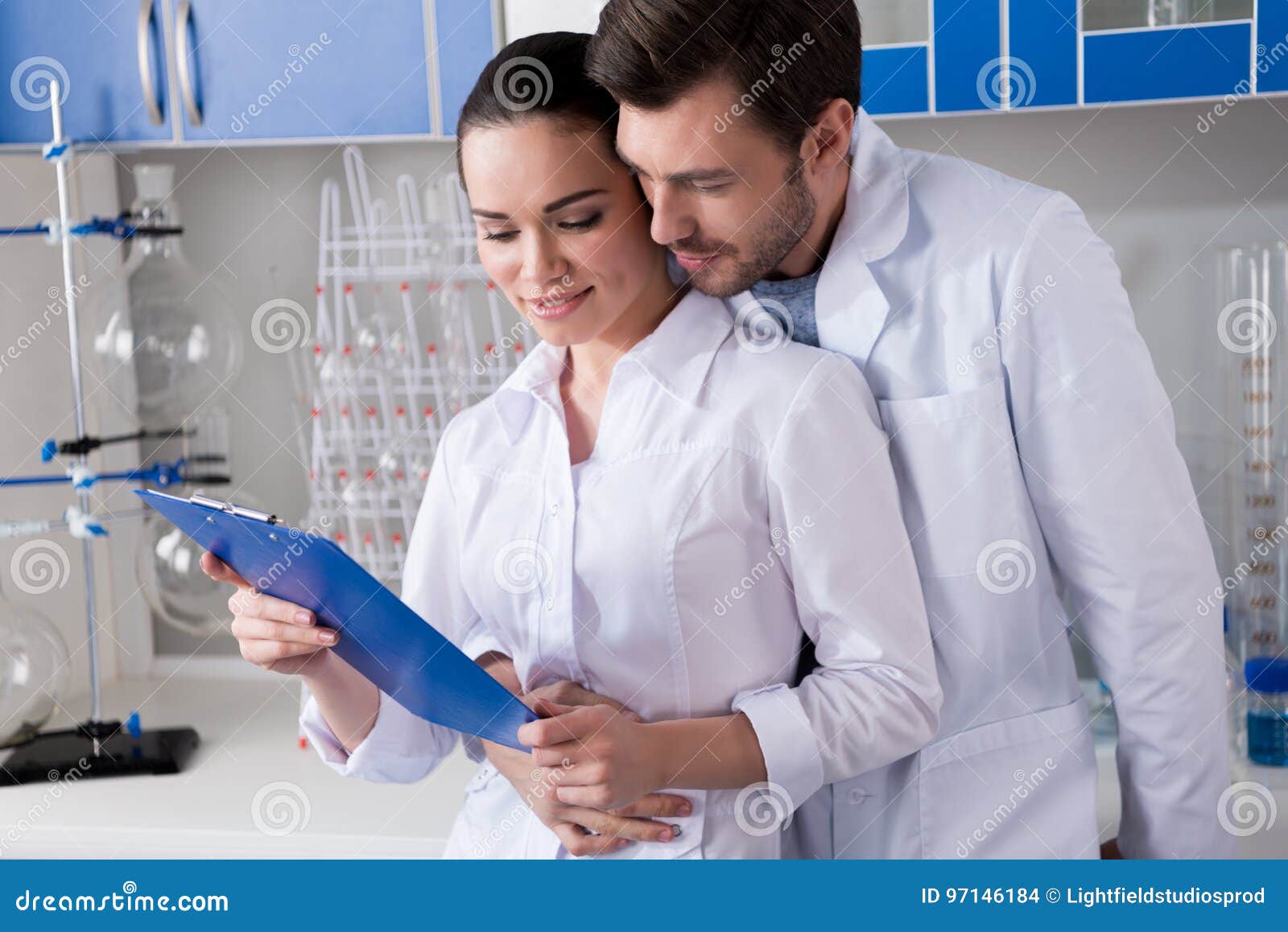 Scientists Having Office Romance at Laboratory Stock Photo - Image of ...