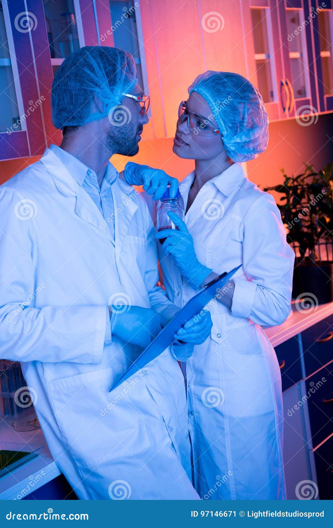 Scientists Having Office Romance at Laboratory Stock Image - Image of ...