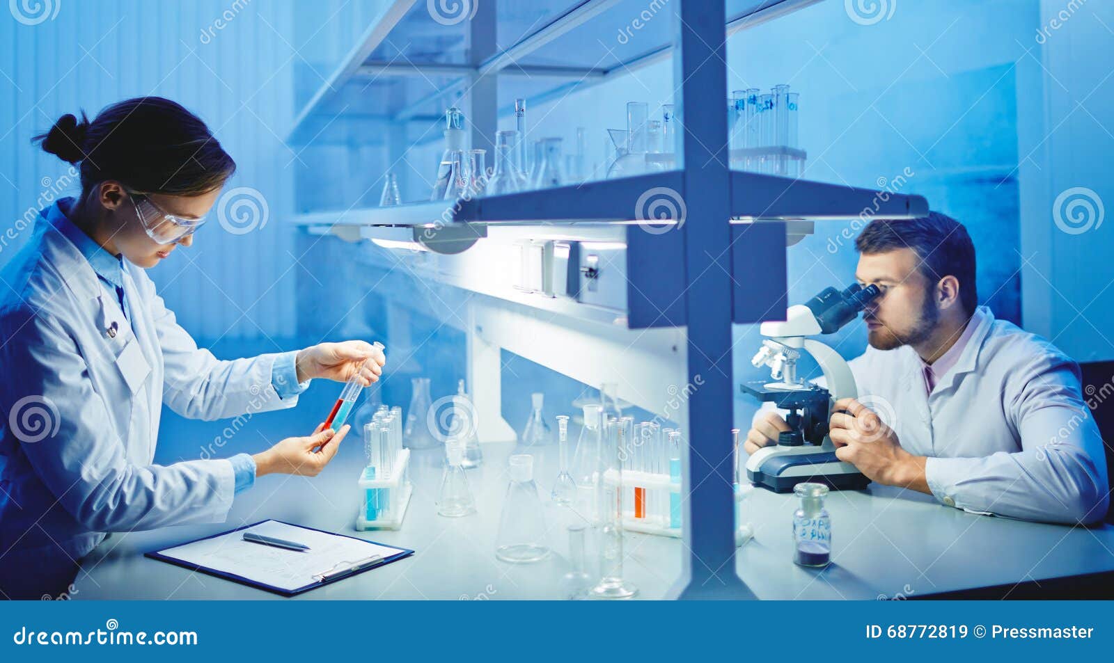 Scientists at laboratory stock image. Image of science - 68772819 Scientists at laboratory stock image. Image of science - 68772819