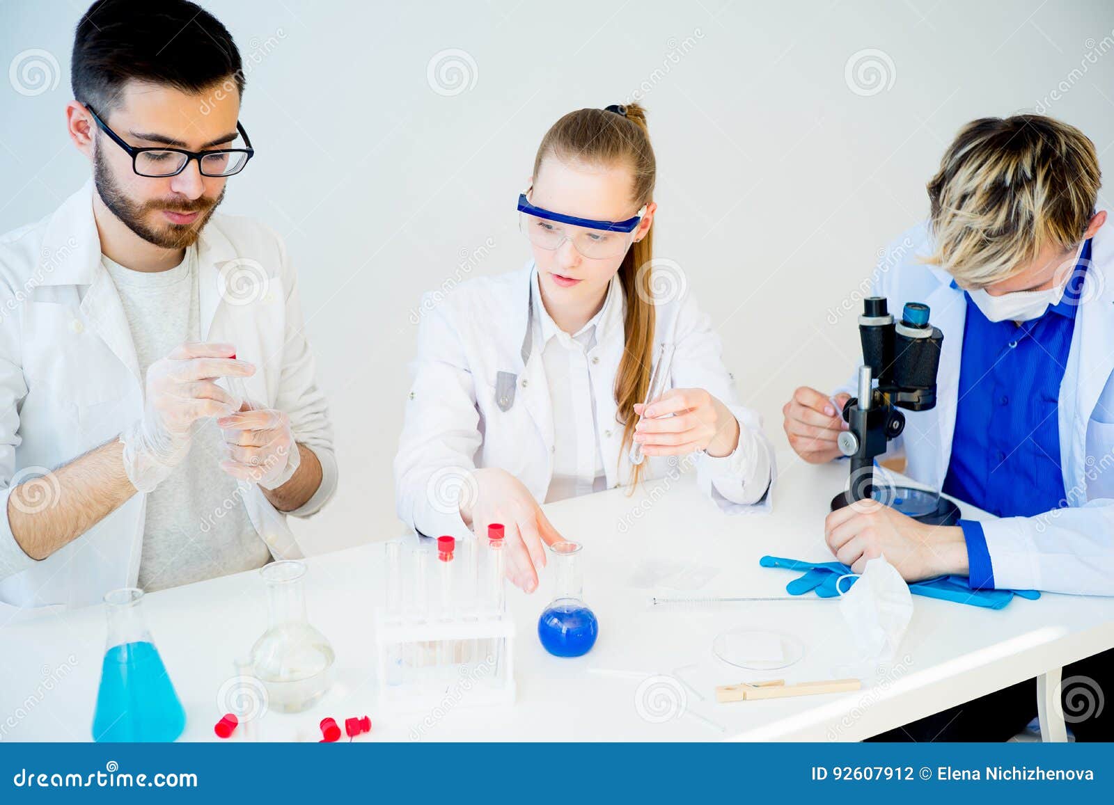 Scientists at laboratory stock photo. Image of biotechnology - 92607912
