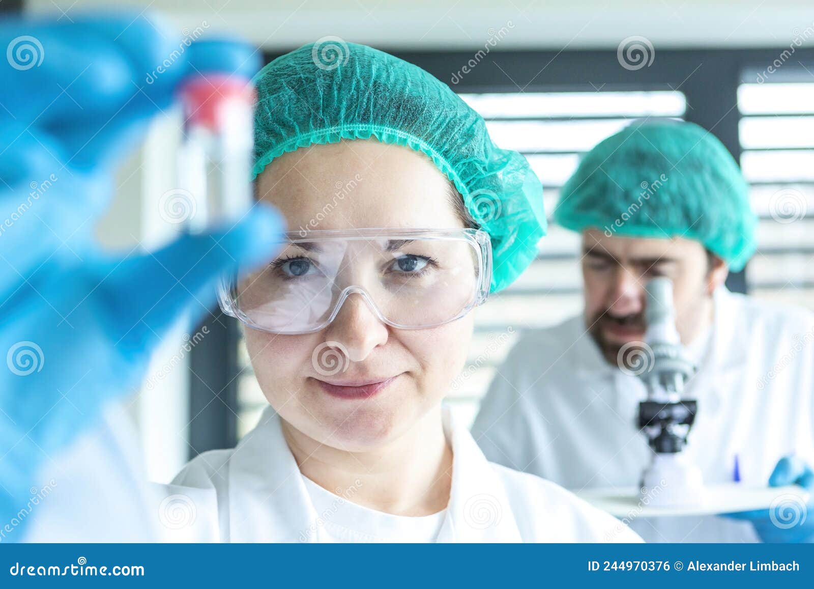 Scientists in a modern lab stock photo. Image of biology - 244970376
