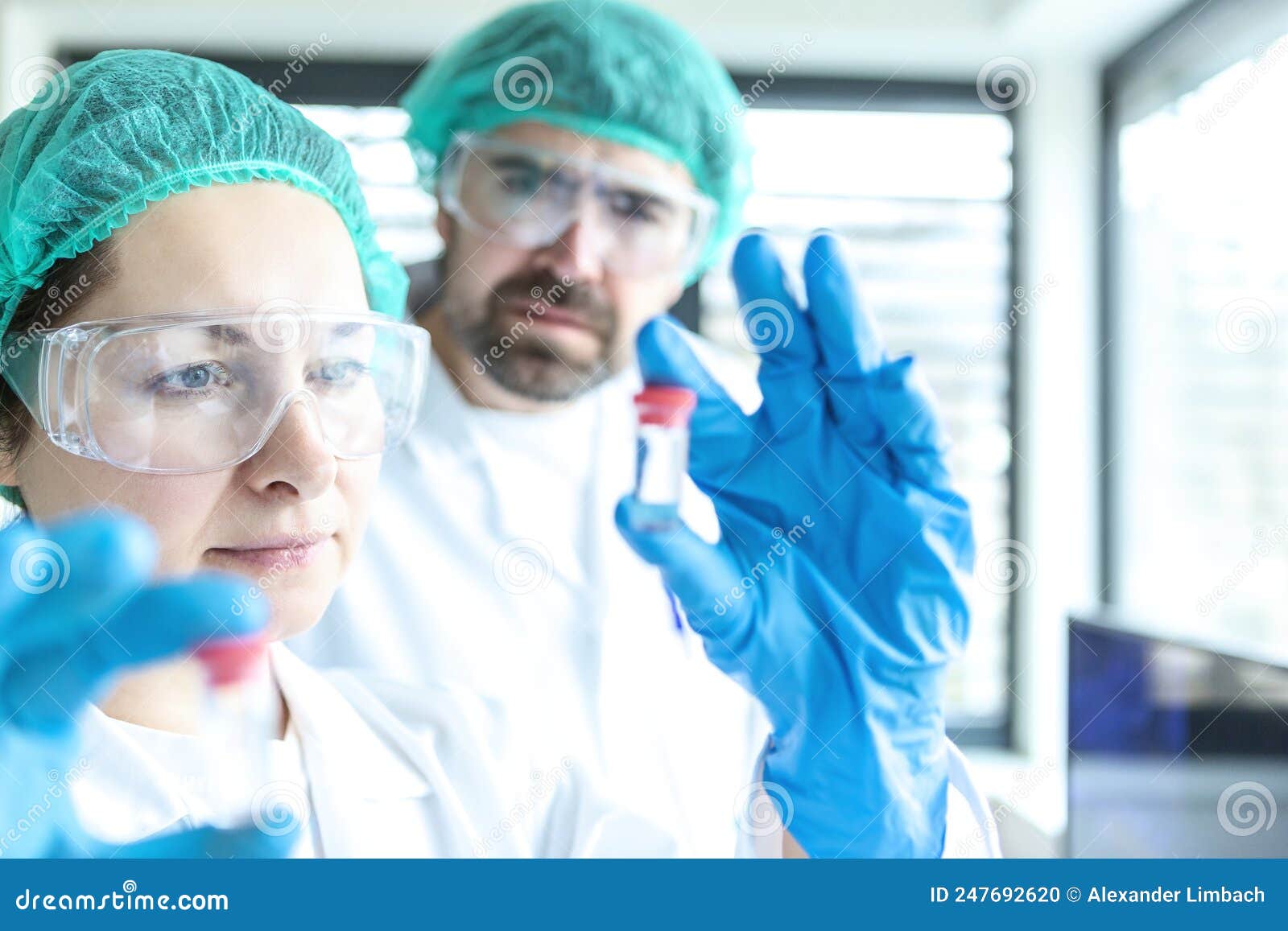 Scientists in a modern lab stock photo. Image of ampule - 247692620