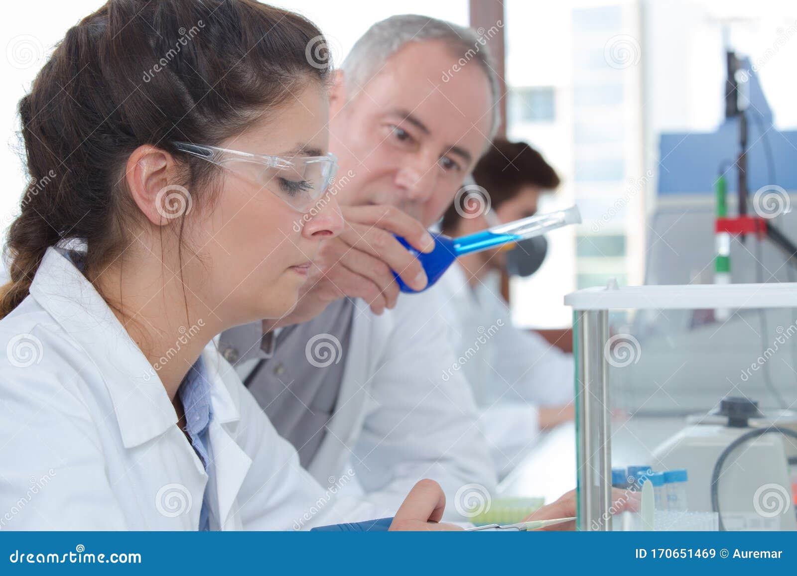Scientists Performing Experiment in Laboratory Stock Image - Image of ...
