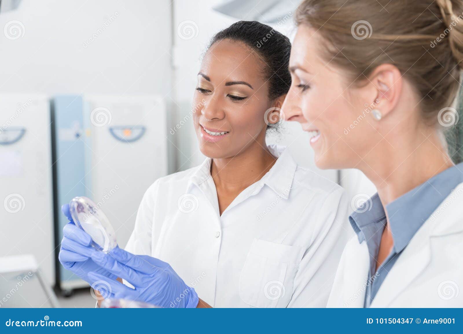 Scientists in Research Lab with Analyzing Instrument Talking Abo Stock ...