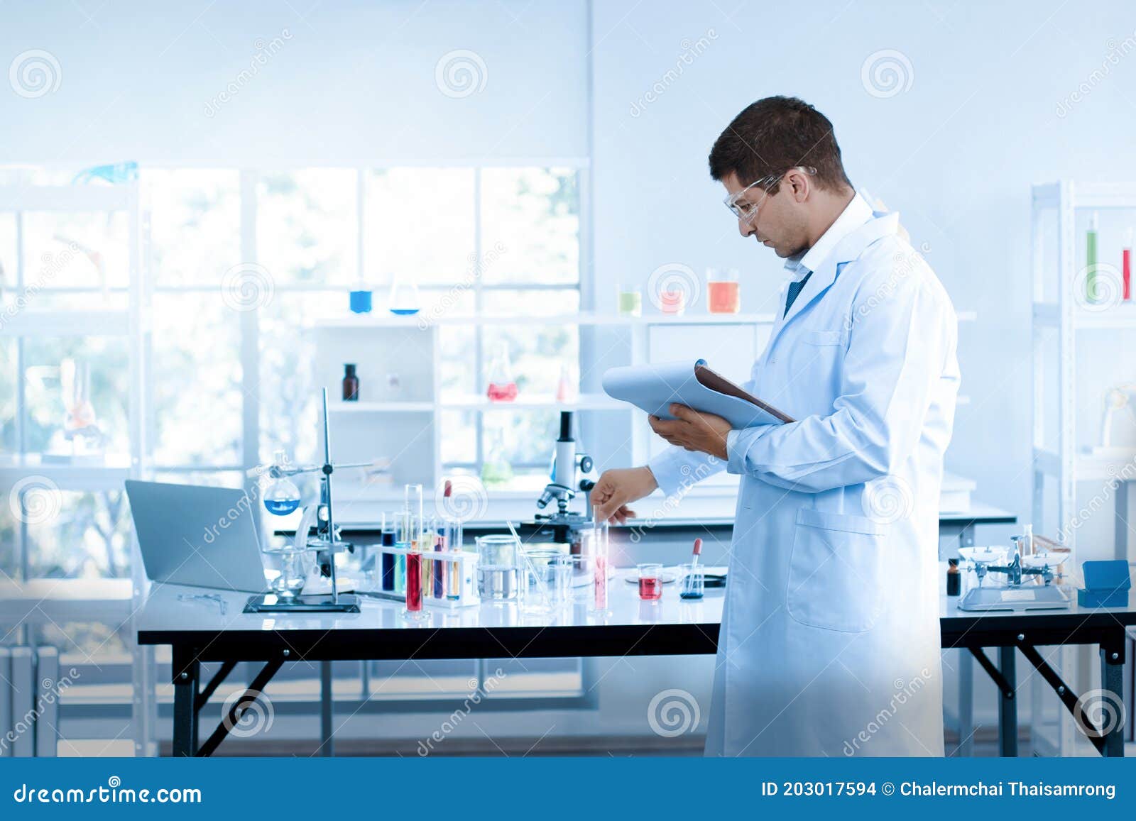 Scientists are Researching and Recording in Science Laboratories Stock ...