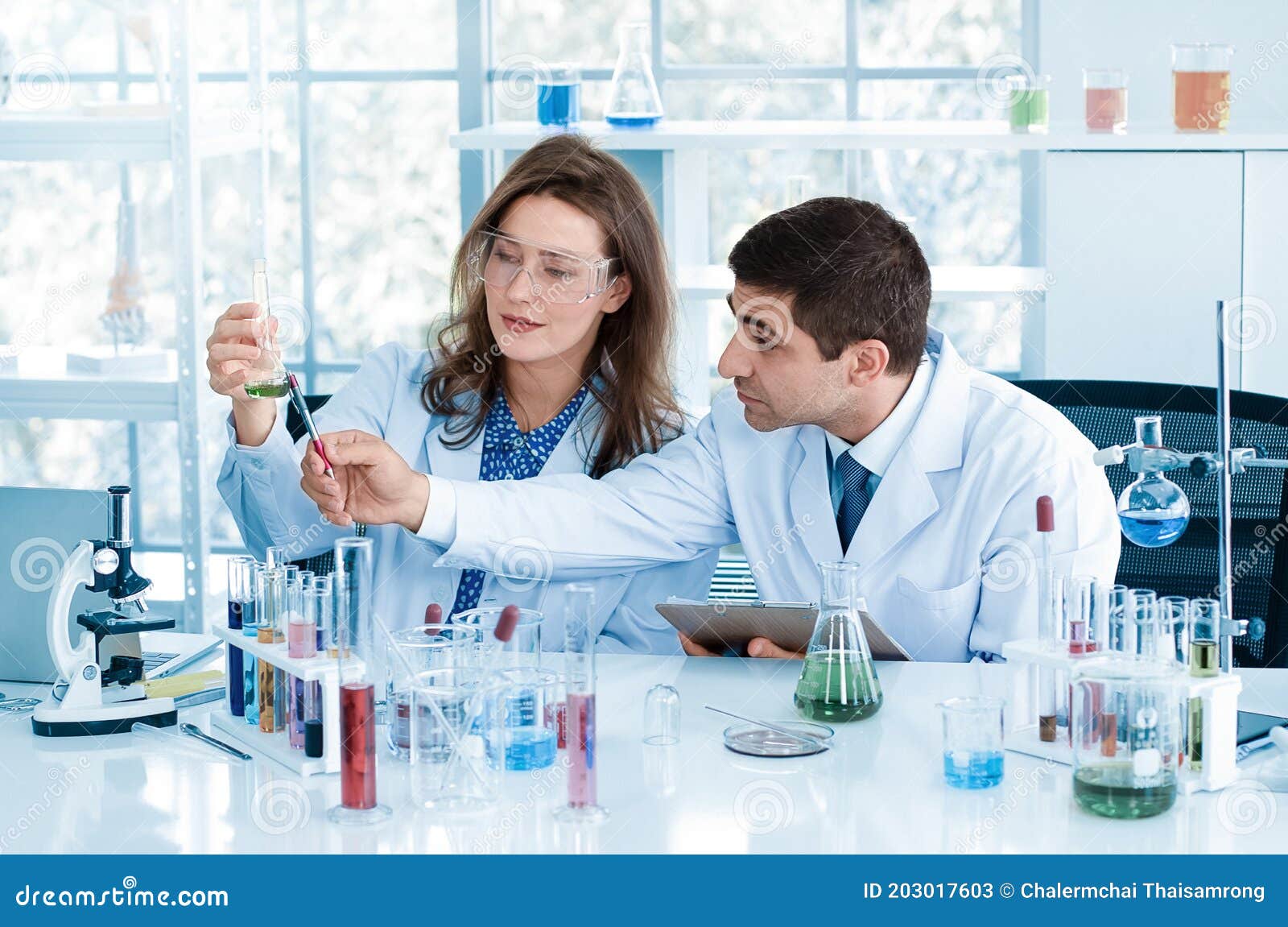 Scientists are Researching and Recording in Science Laboratories Stock ...