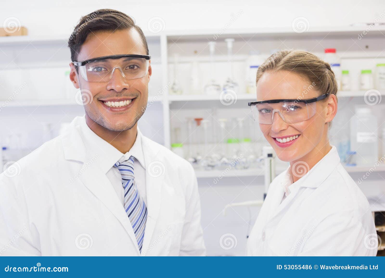 Scientists Smiling and Looking at Camera Stock Photo - Image of ...