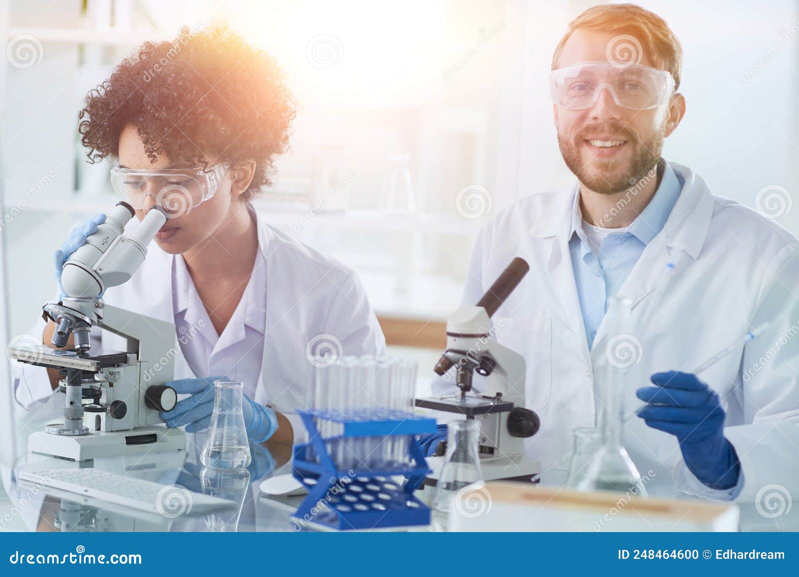 Smiling Scientists Looking at Camera Arms Crossed in Laboratory Stock ...