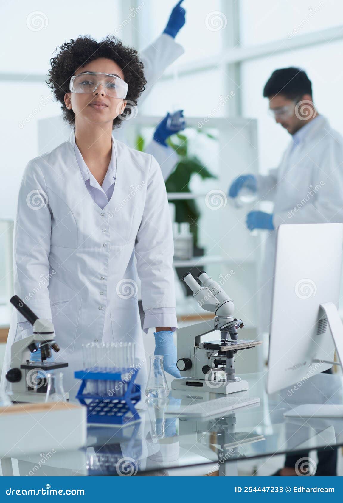Smiling Scientists Looking at Camera Arms Crossed in Laboratory Stock ...