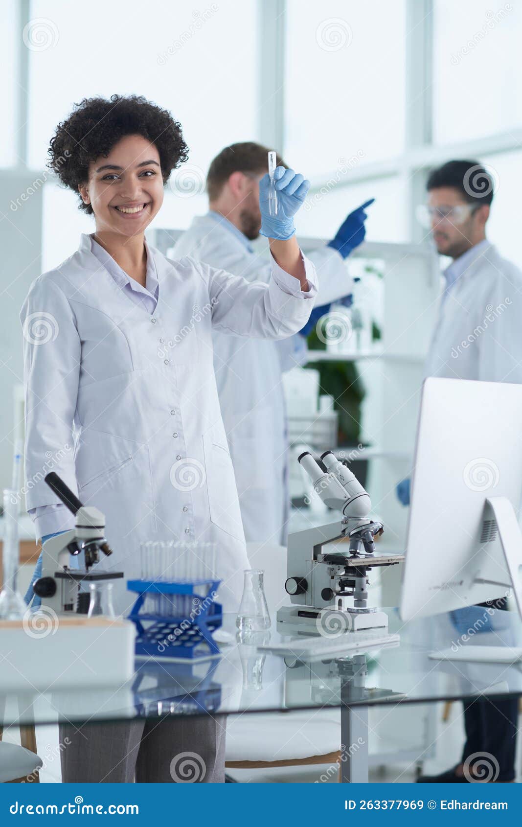 Smiling Scientists Looking at Camera Arms Crossed in Laboratory Stock ...