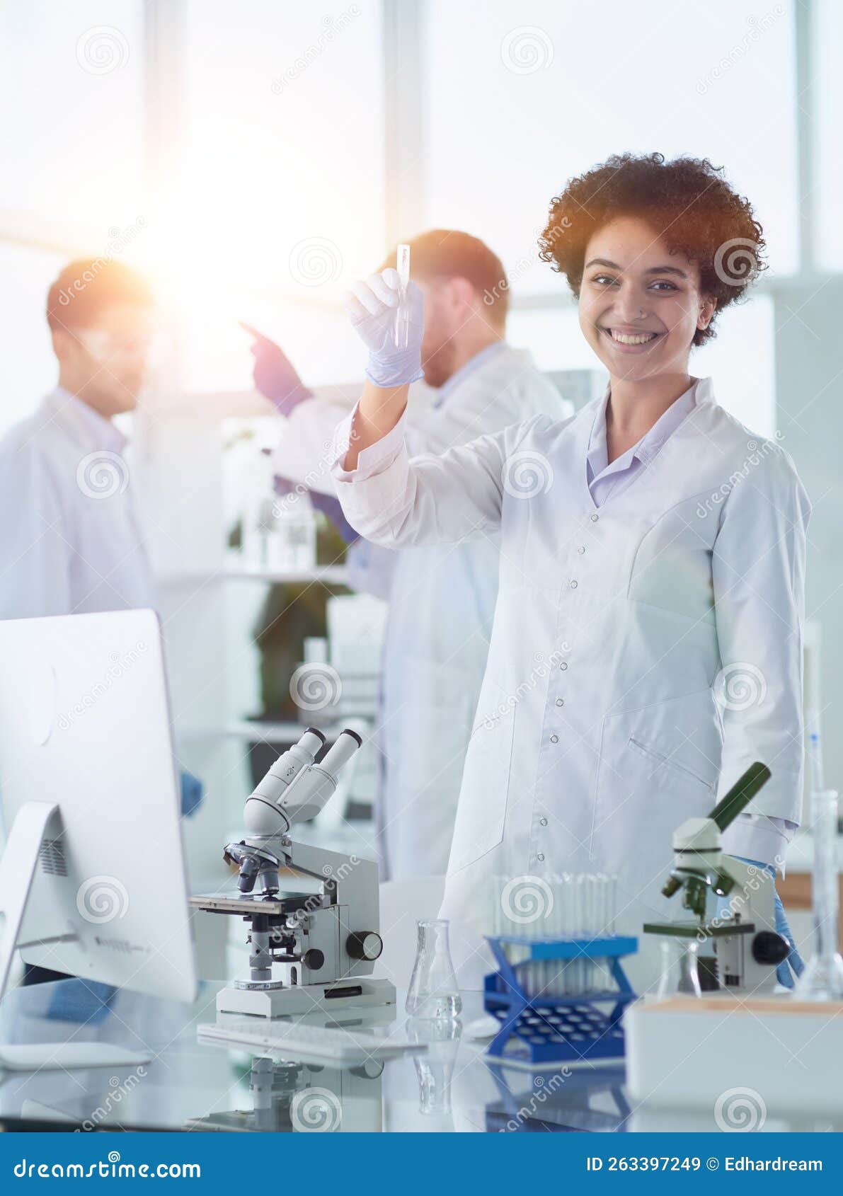 Smiling Scientists Looking at Camera Arms Crossed in Laboratory Stock ...