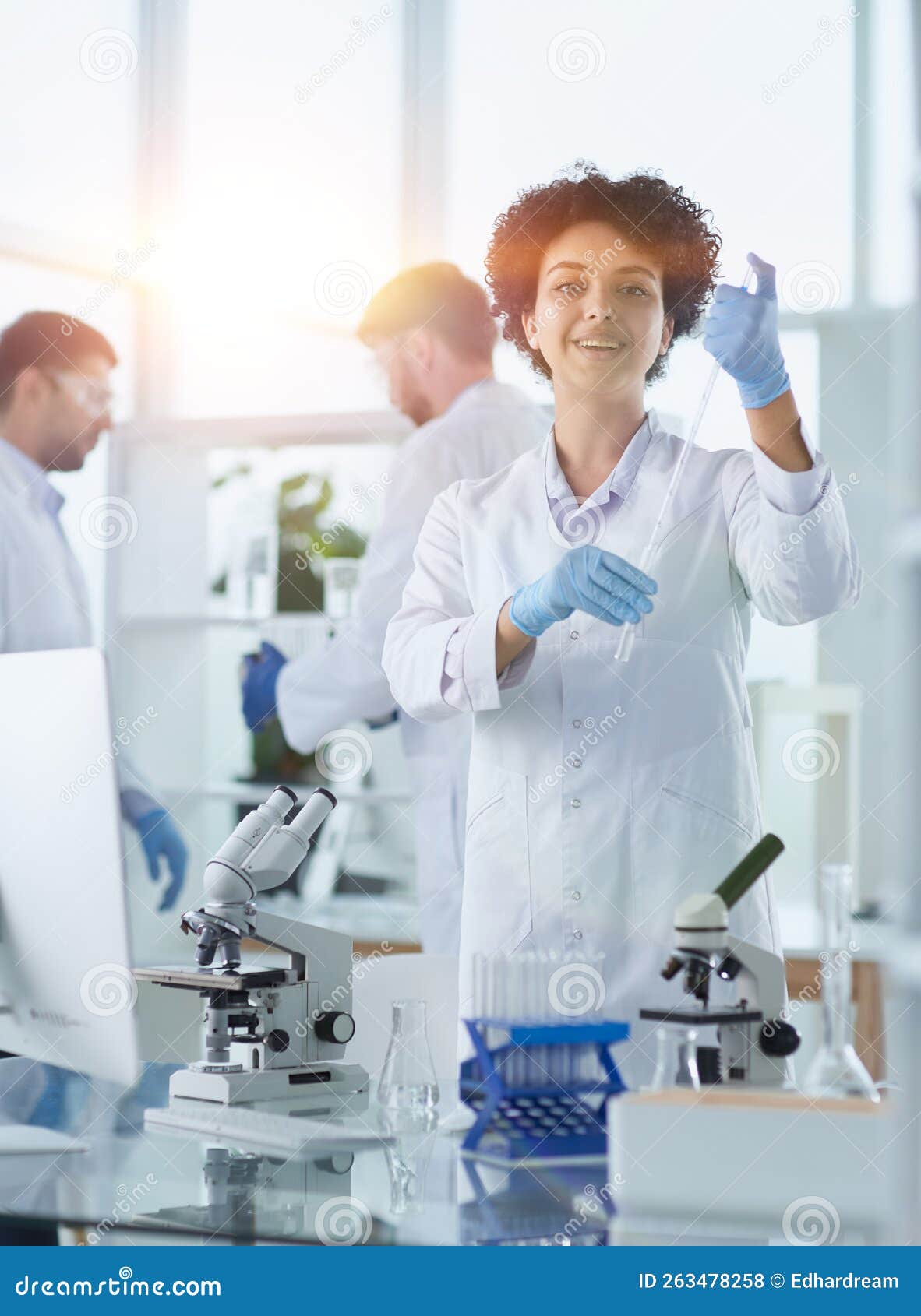 Smiling Scientists Looking at Camera Arms Crossed in Laboratory Stock ...