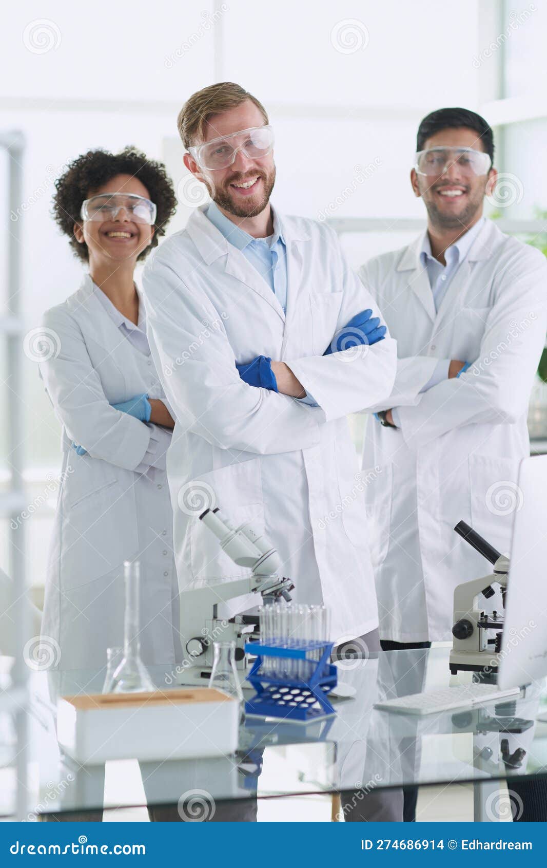 Smiling Scientists Looking at Camera Arms Crossed in Laboratory Stock ...
