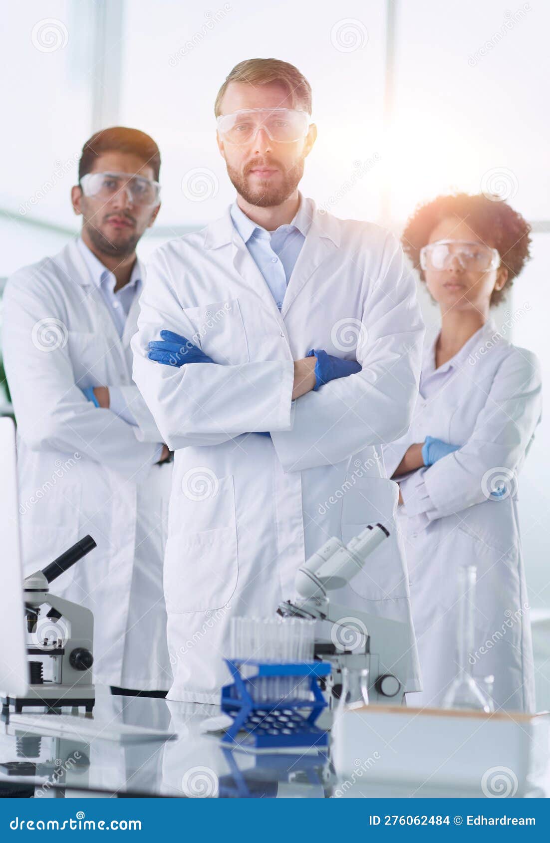 Smiling Scientists Looking at Camera Arms Crossed in Laboratory Stock ...